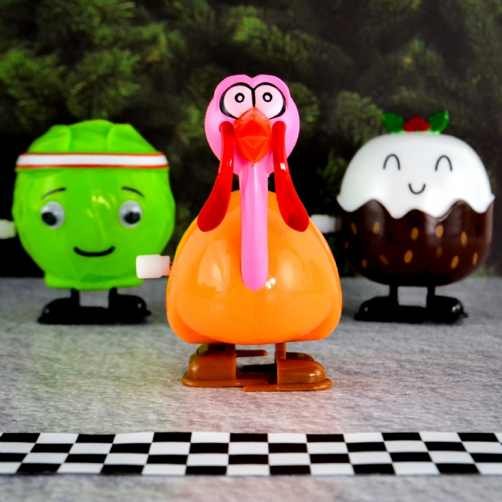 Racing Christmas Dinner Wind-Up Toys | Find Me A Gift